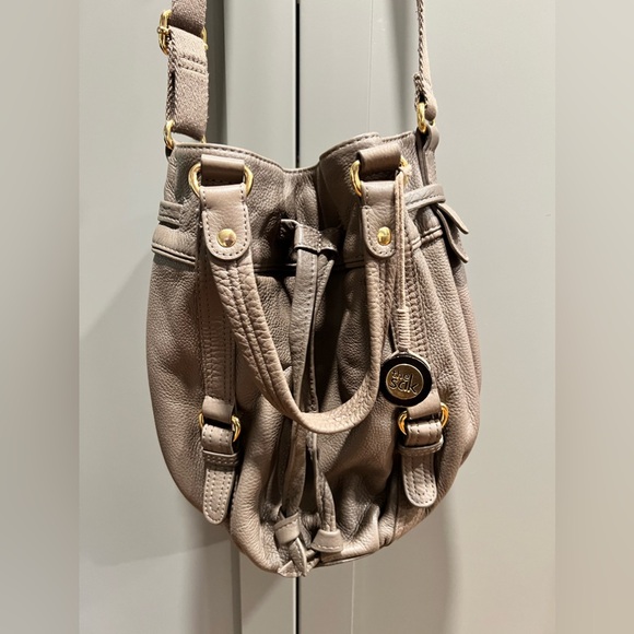 The Sak | Bags | The Sak Graytaupe Leather Cinch Crossbody Bag | Poshmark